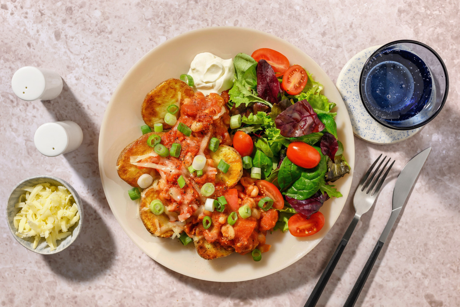 Cheat’s Spiced Bean Jacket Potatoes Recipe | HelloFresh